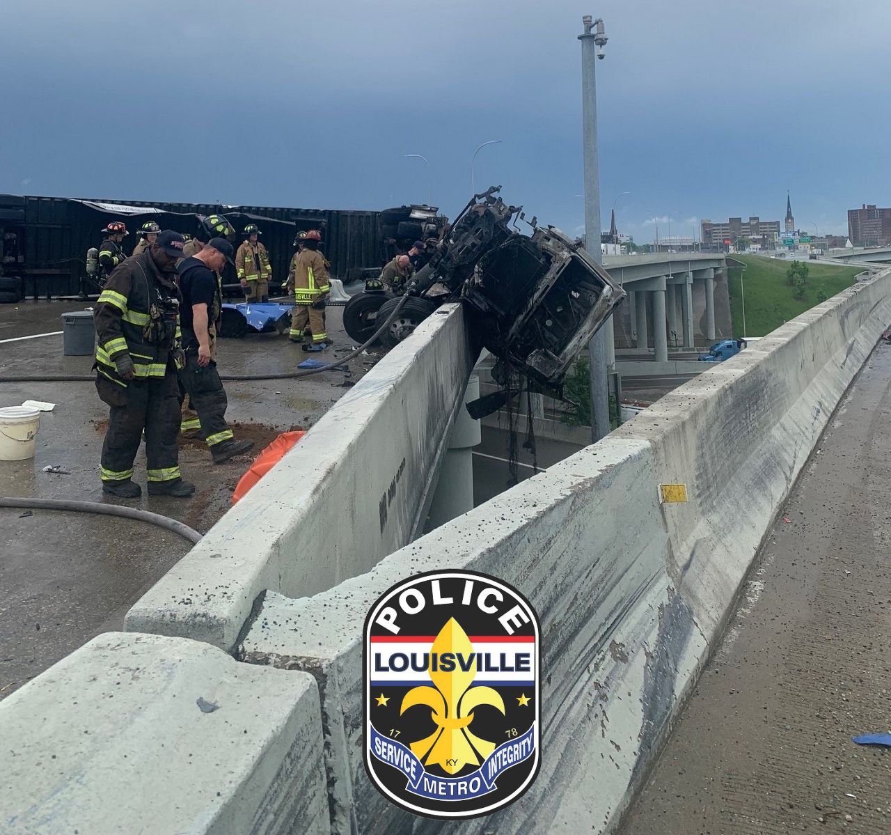 Fiery semi-truck crash shuts down I-65 south in Louisville