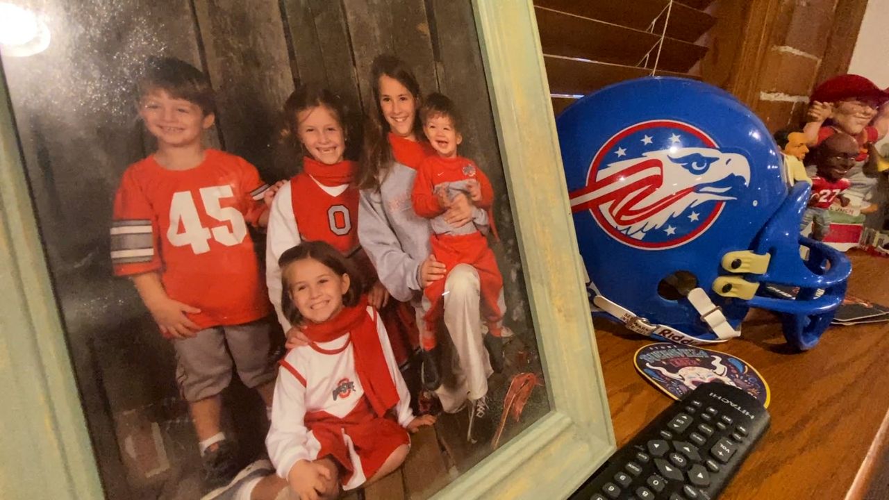 OSU broadcaster gets rare chance to watch Hawkeye son play