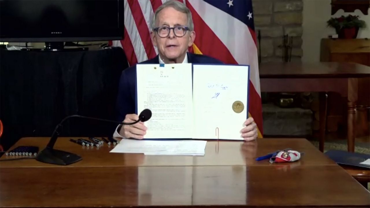 DeWine Signs Child, Animal Cross-Reporting Bill
