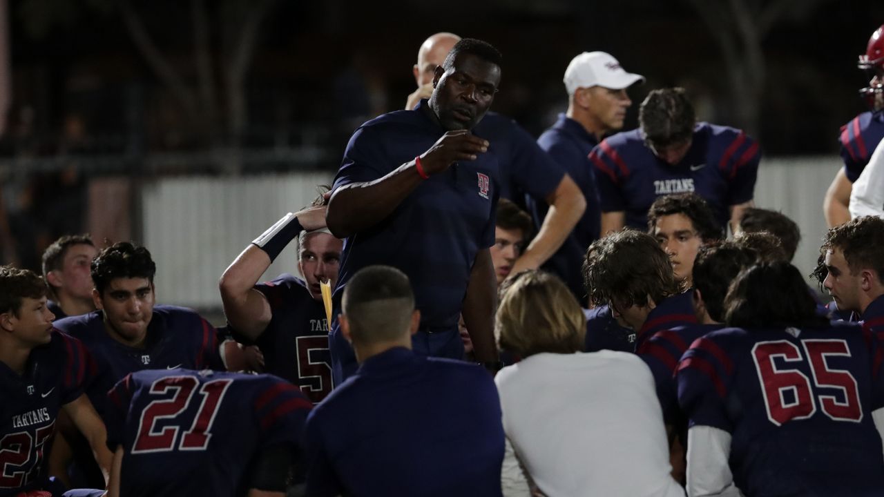 St. Margaret Black Coach Stands Out in a White City