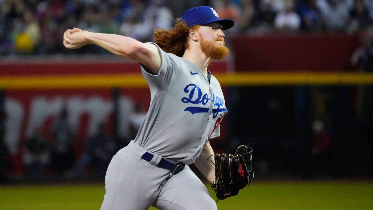 May throws 6 impressive innings, Dodgers beat D-backs 5-2