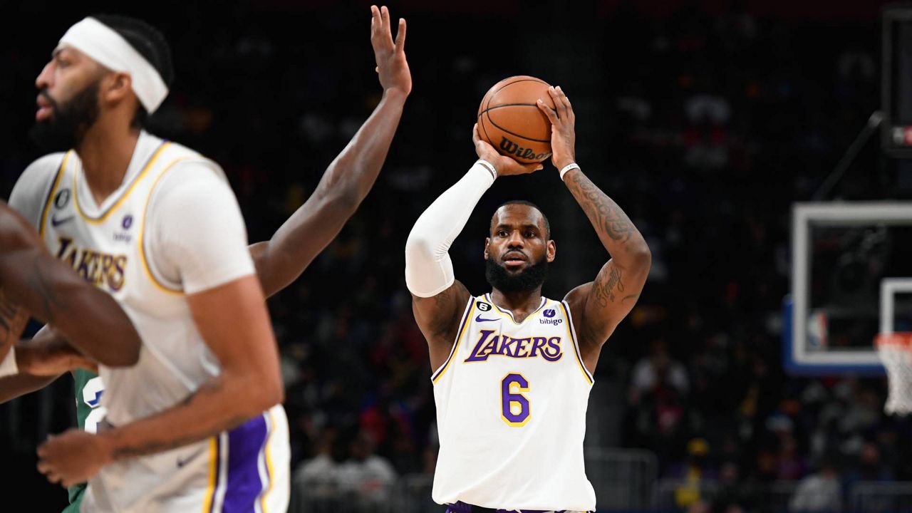 James, Davis help Lakers fend off NBA's worst team