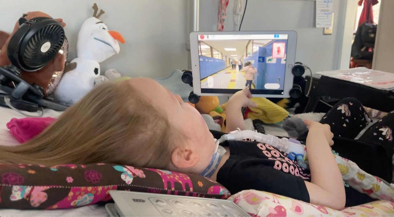 Assistive robots bring homebound kids into Madison schools