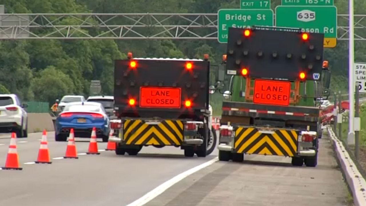 Crews installing new lighting on stretch of I-690 in Syracuse
