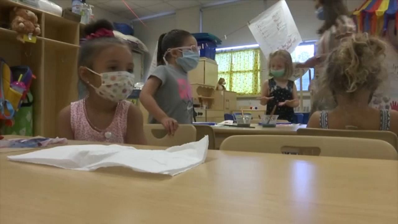 AAP at odds with CDC on masking in schools