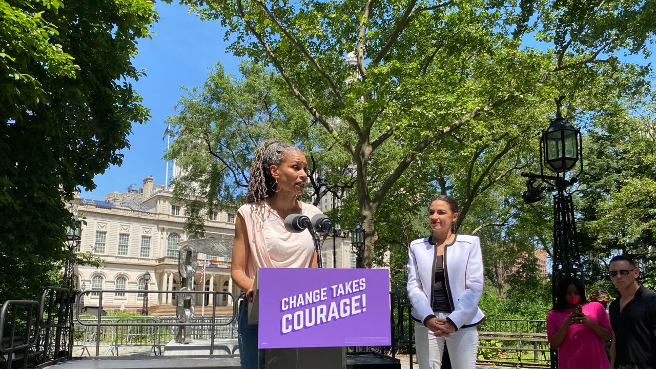 Wiley, Adams trade barbs on policing plans