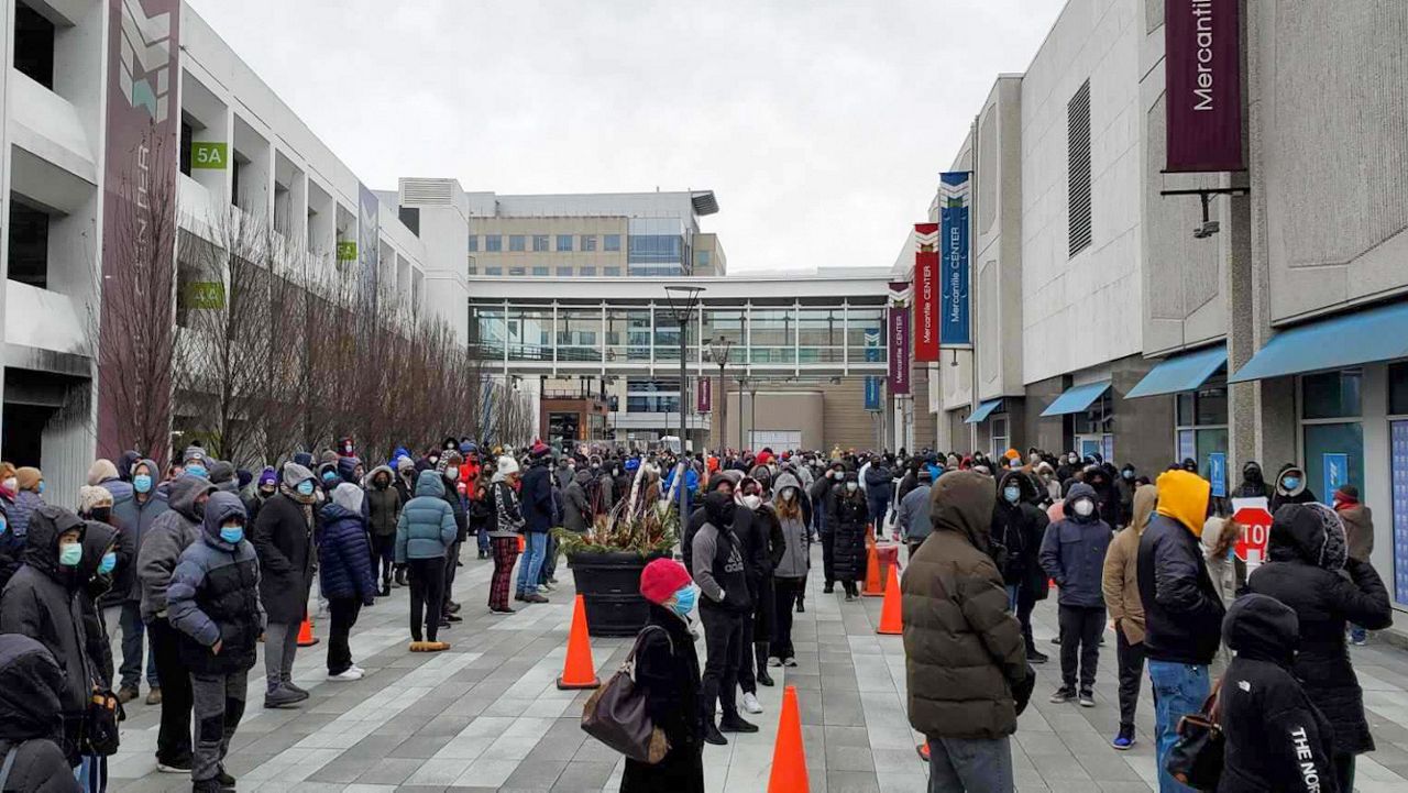 COVID-19 test lines long in downtown Worcester