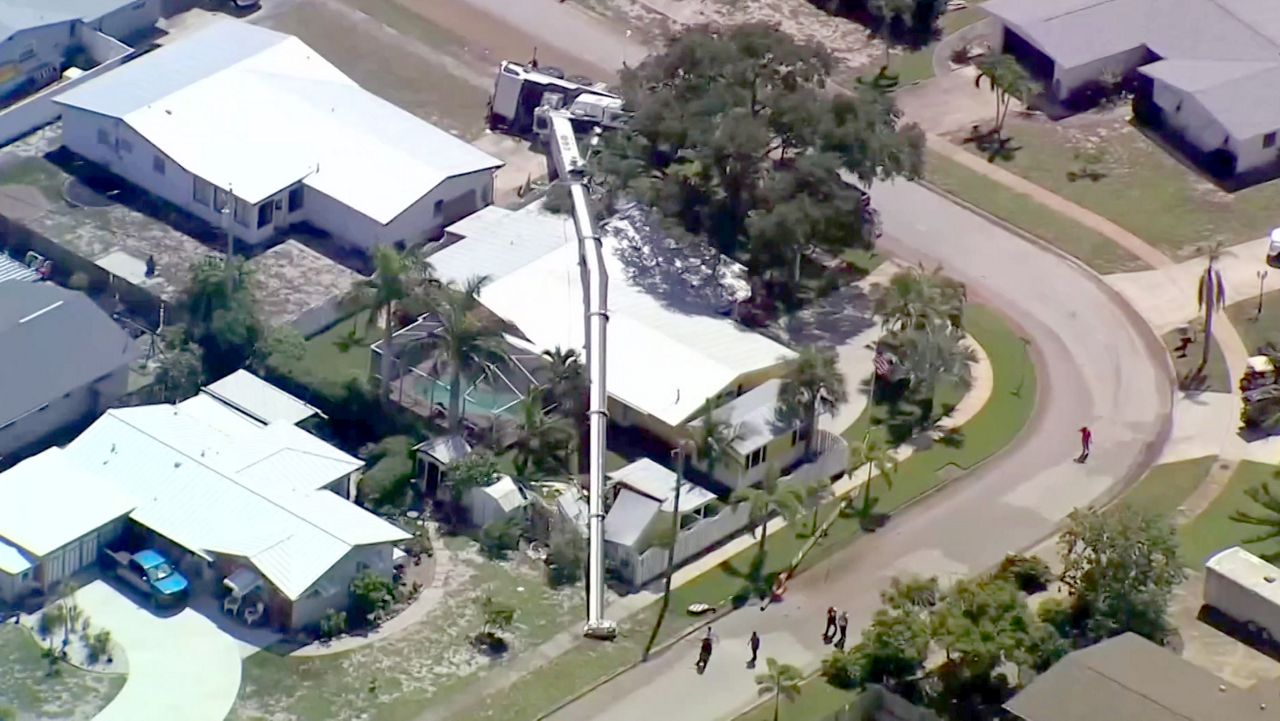Crane falls onto Merritt Island home