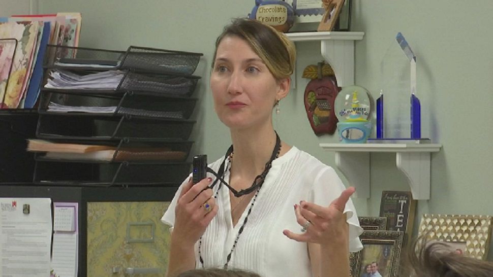 A+ TEACHER: "Knuckle" Greeting Reflects Polk Educator's Approach