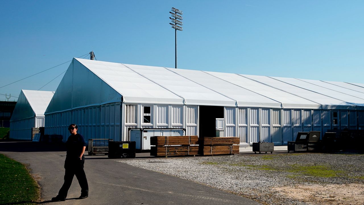City officials give tour of Randall's Island relief center