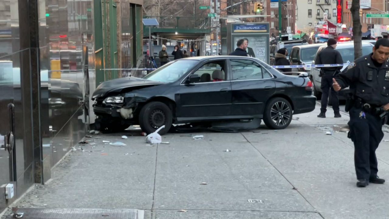 Woman injures 6 after crashing vehicle into building: police