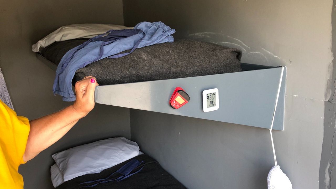 Mock jail cell demonstrates lack of AC in Florida prisons