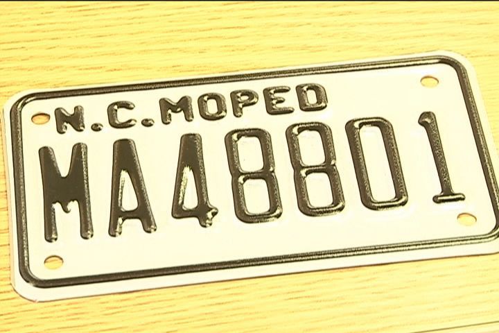 Moped Riders Purchase New Required License Plates