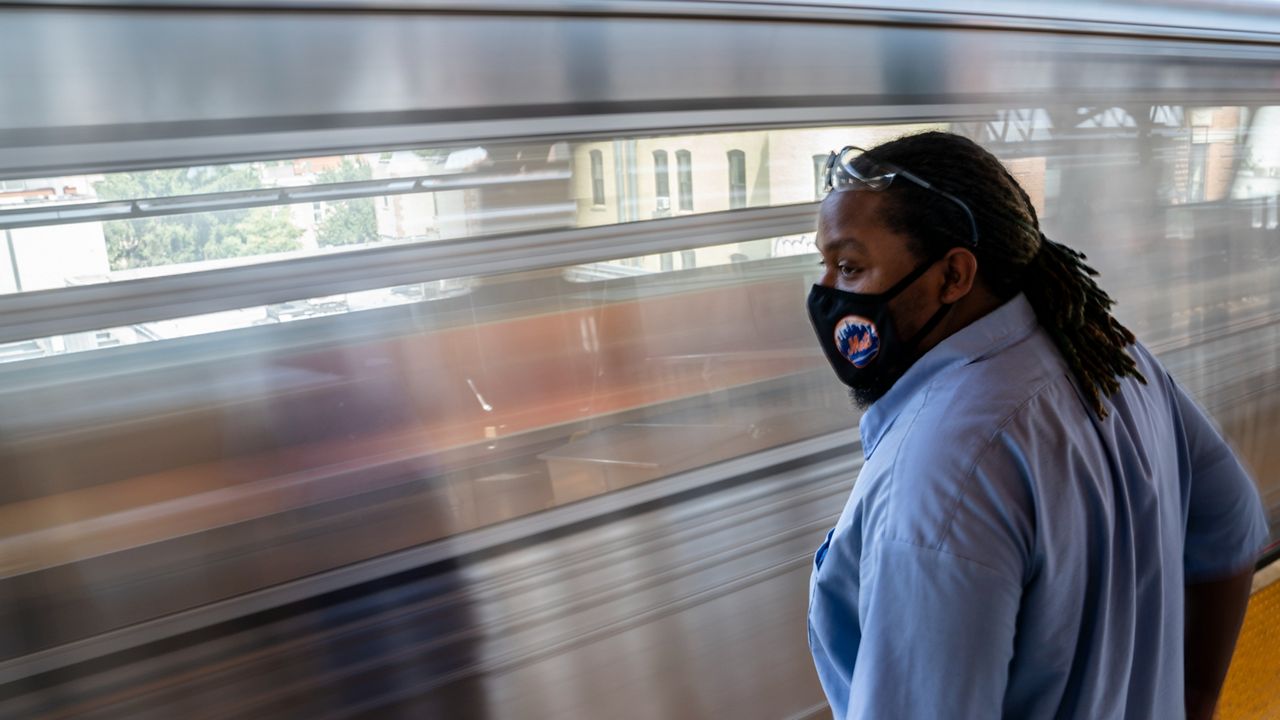 MTA station agents preparing to exit the booth