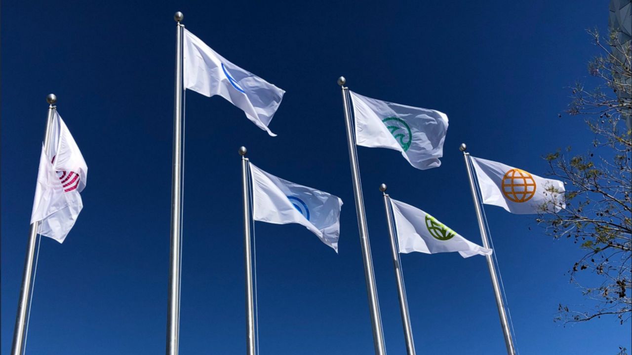 Disney World Installs New Icon Flags at Epcot
