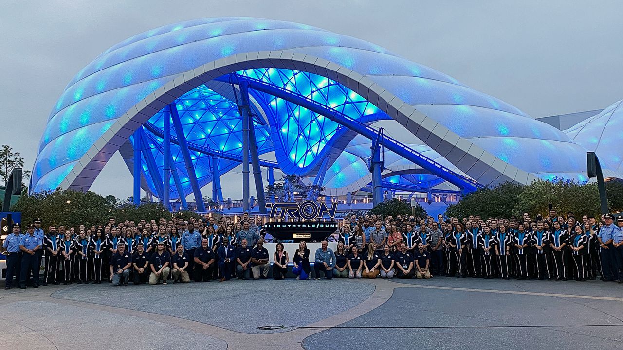 Disney cast members celebrate opening of TRON