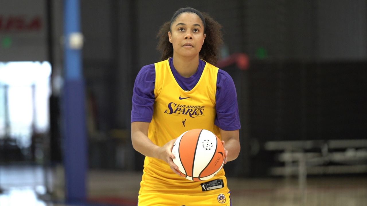 Nia Coffey making history in LA, along with brother, Amir