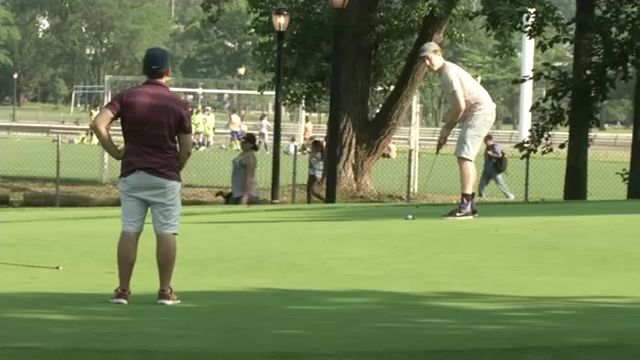 Night swings on par for Queens golf course