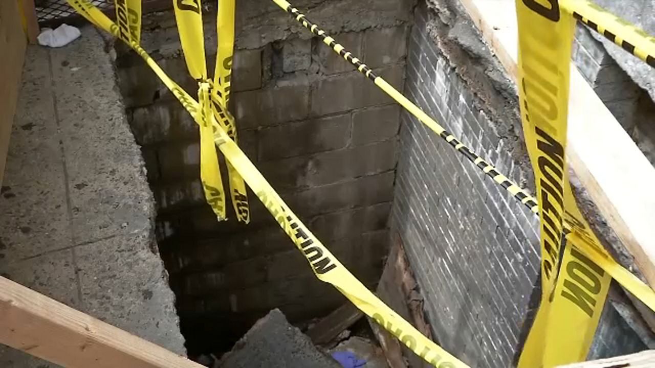 Woman falls six feet through collapsed Manhattan sidewalk, NYPD says