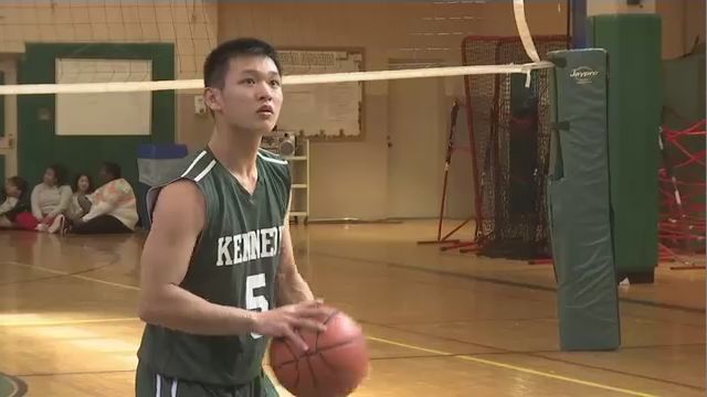 Ken Zhang: Queens Basketball Player Stands Tall When Assisting Others