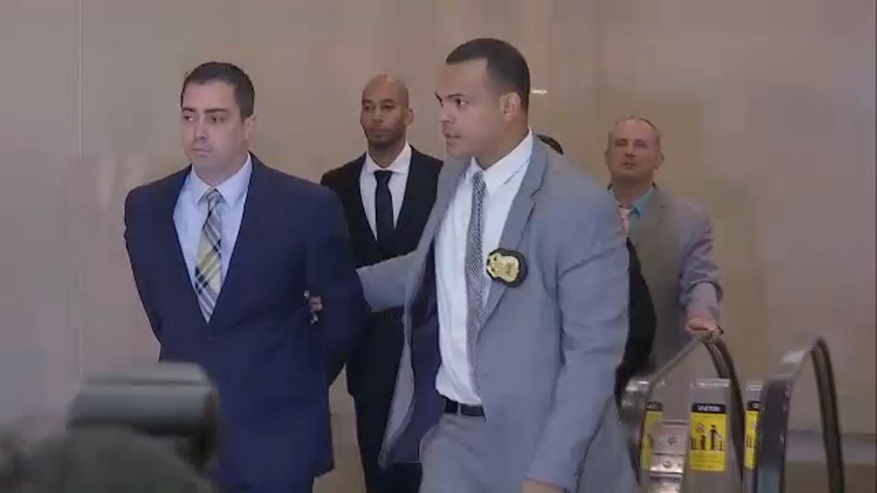 Police officers charged with rape quit NYPD