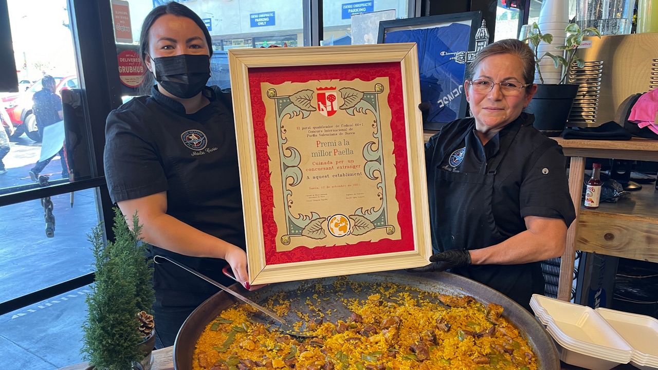 Mother and daughter team contest for best international paella