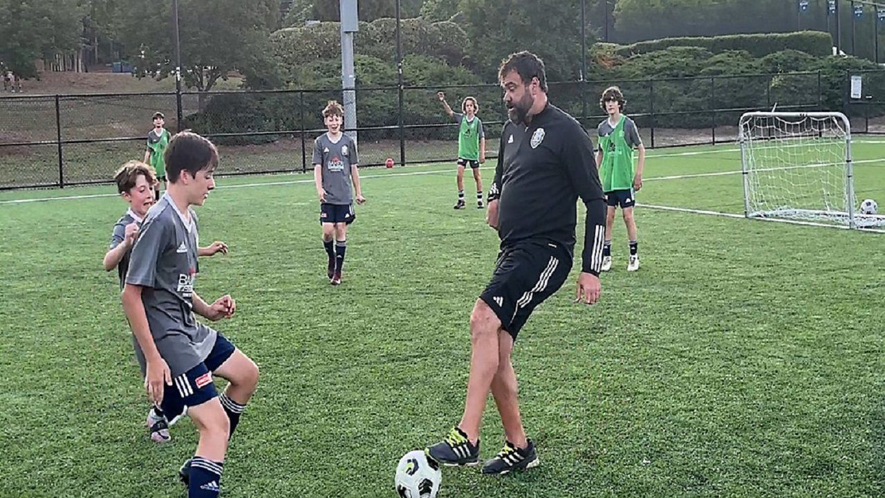 Hall of Fame soccer player uses life story to coach kids