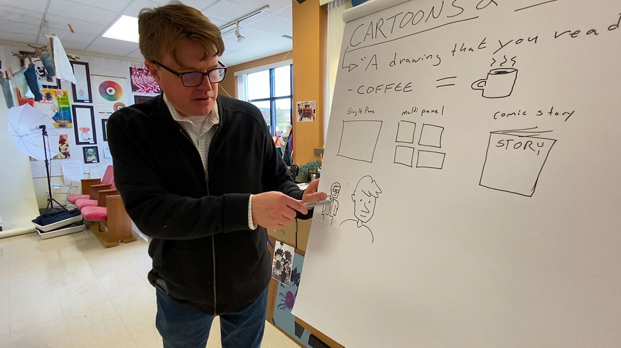 Professional cartoonist works with Brookfield students