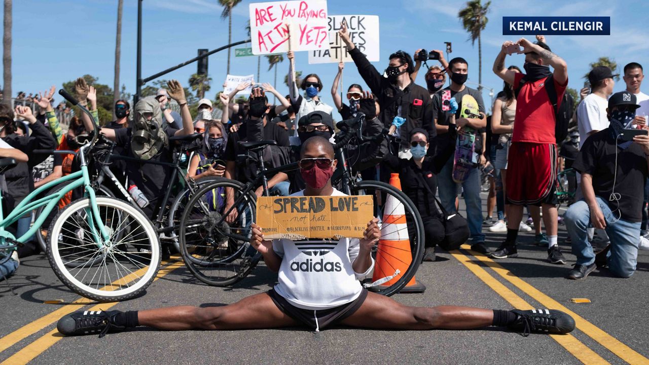 Photographer Recalls Experience Covering Protests from the Front Lines