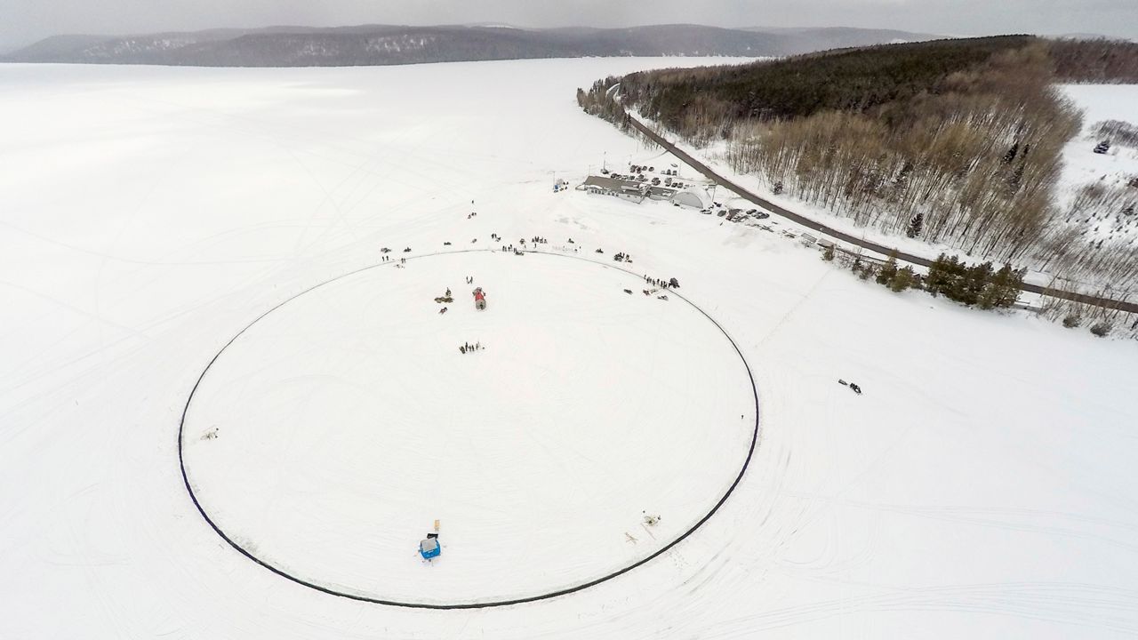 Maine community creates massive ice carousel on frozen lake