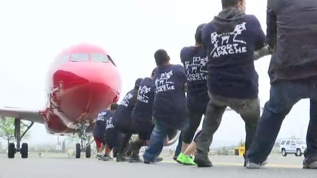 Law Enforcement, Military From Around Globe Participate in Plane Pull ...