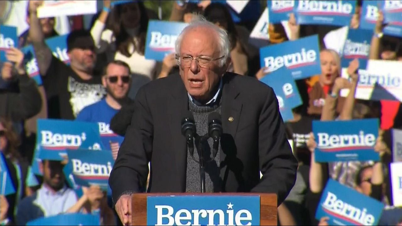 AOC Officially Backs Bernie at Campaign Rally in Queens