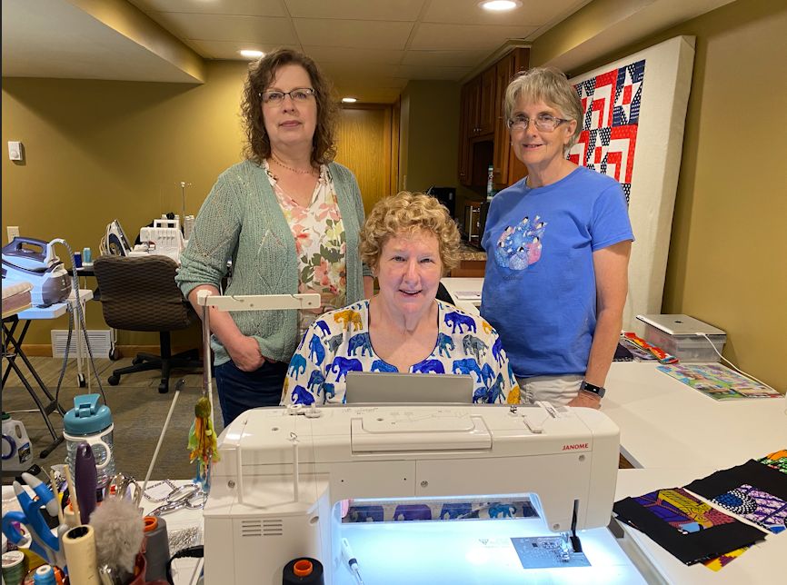 Quilters sew together friendships, quilt for good cause