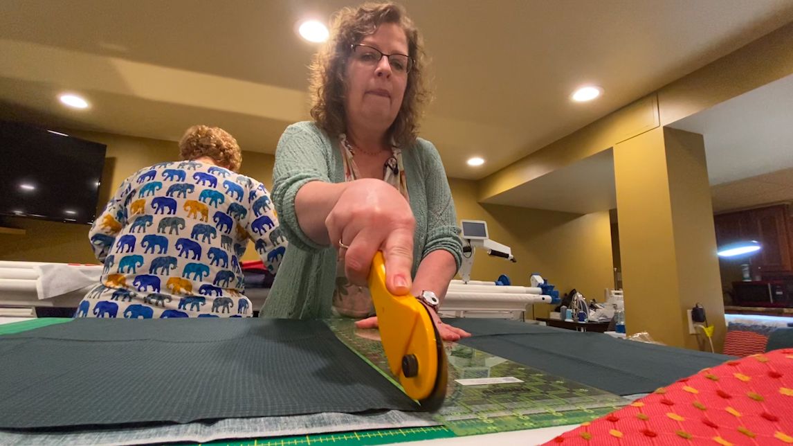 Quilters sew together friendships, quilt for good cause