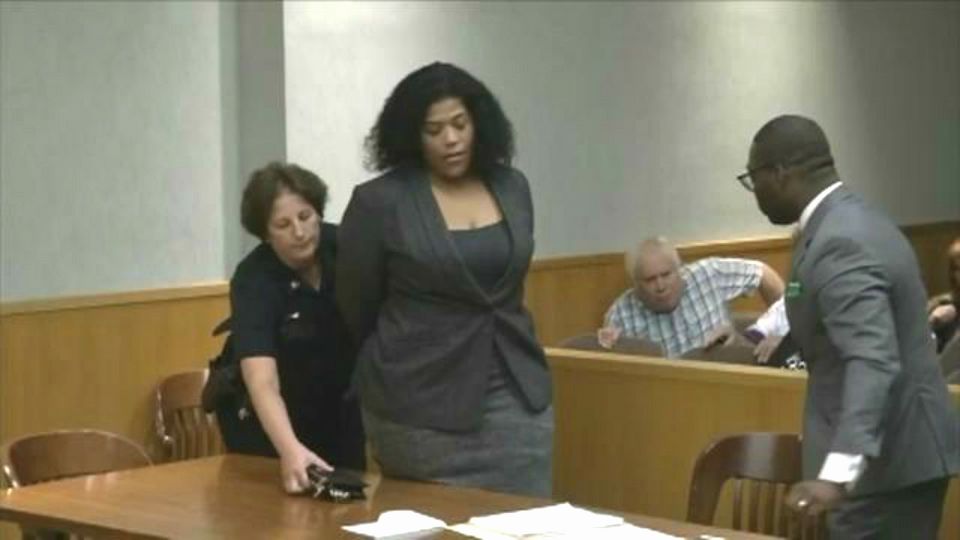 Astacio again led away in handcuffs