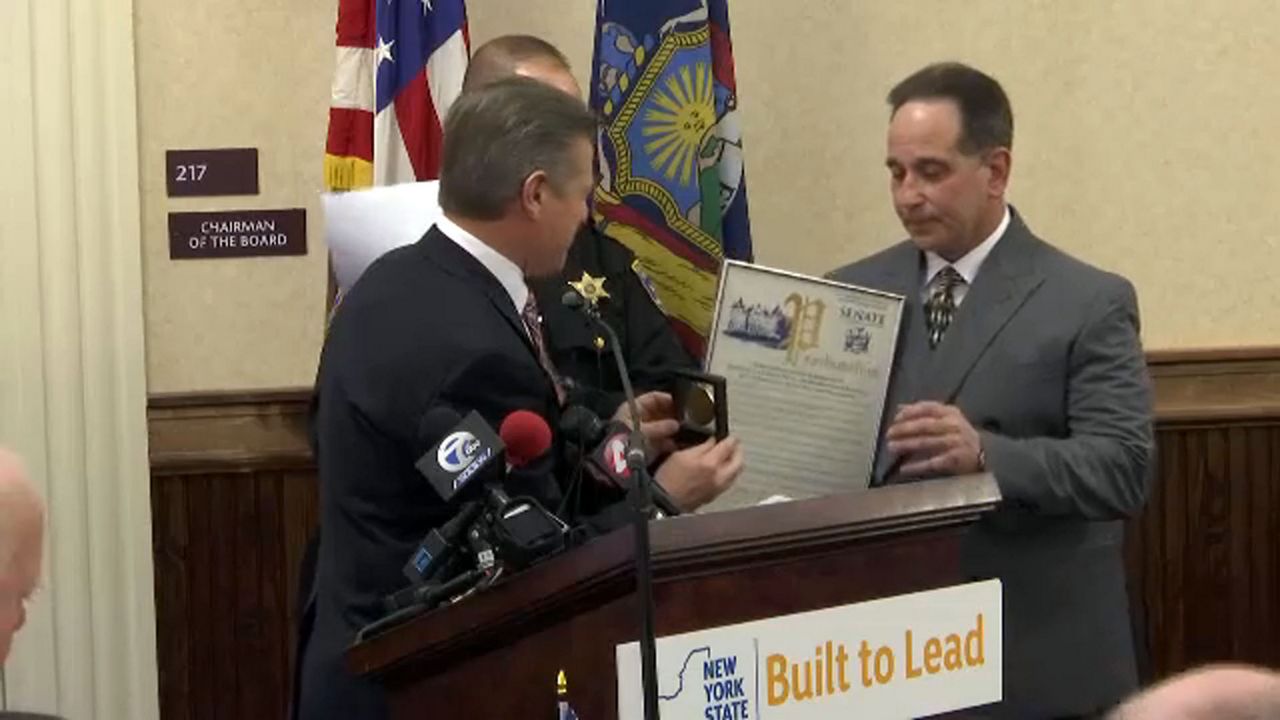 Postal Worker Honored For Saving Sheriff
