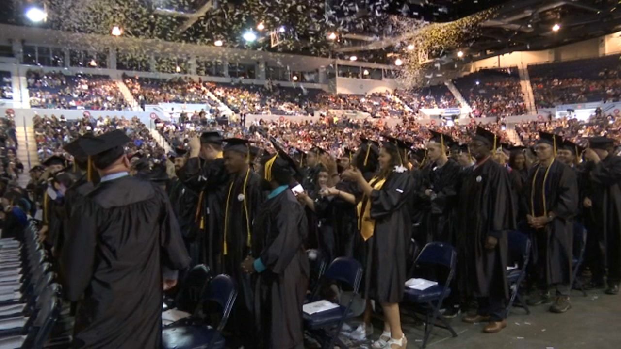 Monroe Community College graduates