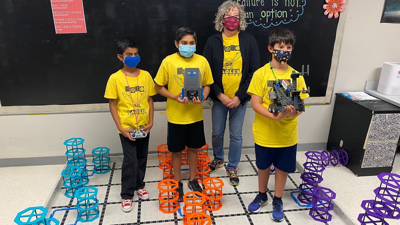 Elementary robotics trio advances to world competition