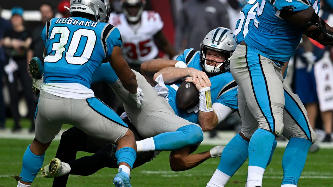 Brady, Bucs rally to beat Panthers 30-24, clinch NFC South