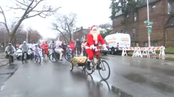 Santa ditches the sleigh for Queens bike ride