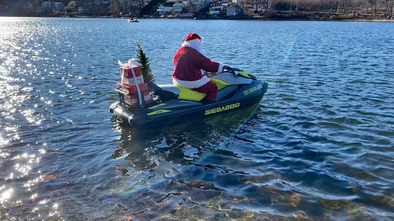 Santa rides jet ski across Lake Quinsigamond