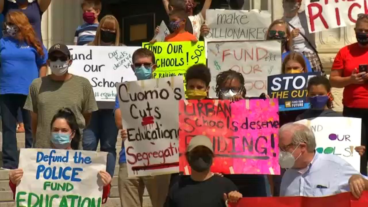 Protesters Rally Against Cuts to School Aid in Albany