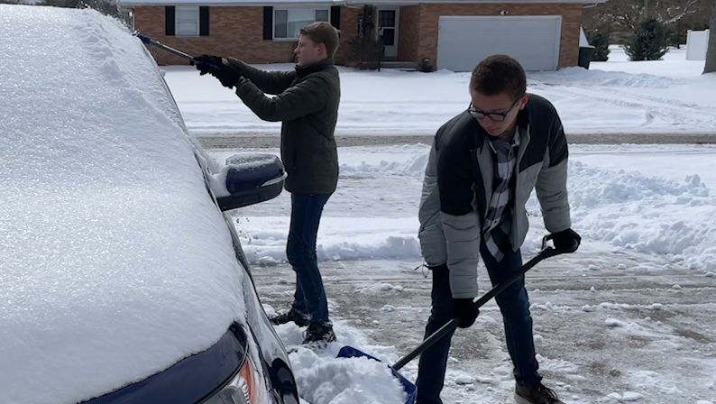 Kids Help Neighbors Dig Out After Big Snowfall