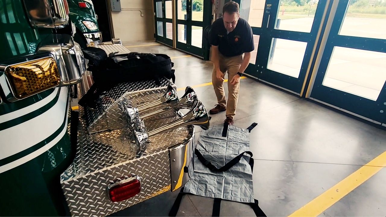 Firefighter designs transport bed after Sikh Temple tragedy