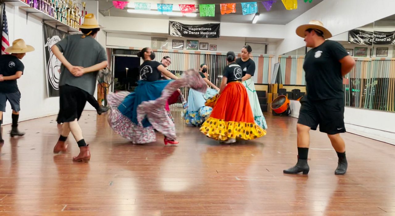 One folklórico group is telling a story through dance