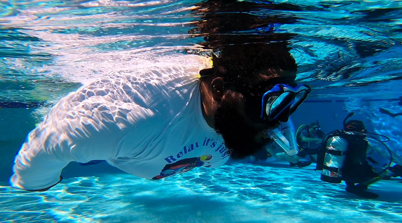 Black instructor aims to diversify scuba diving