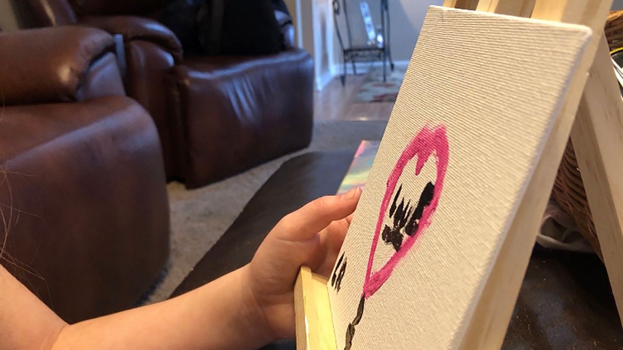 Second Grader Paints to Help Feed Community