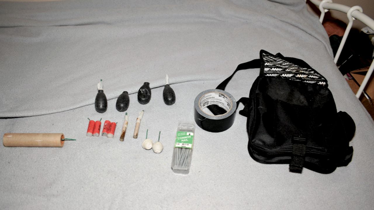 Explosive device found on suspect at courthouse protest