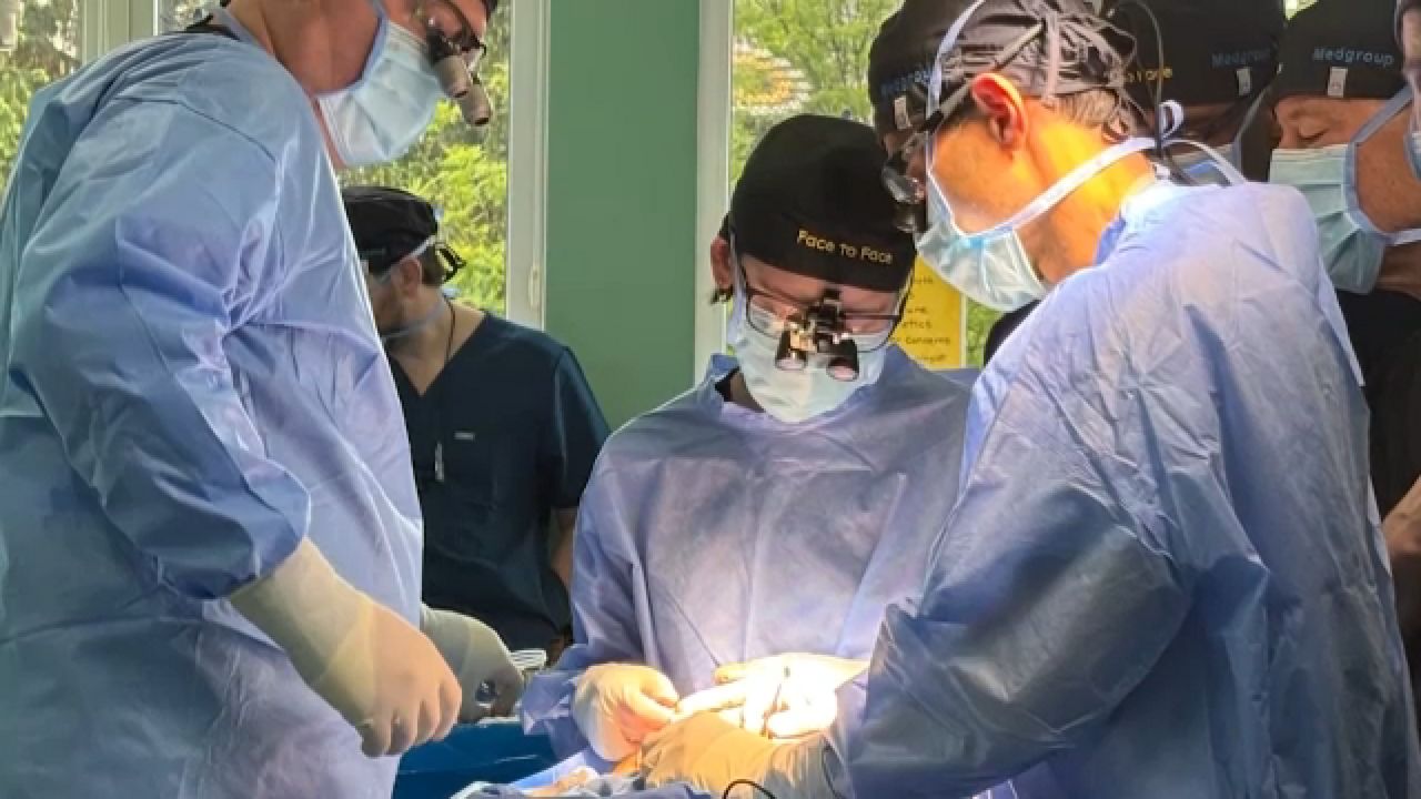 Doctors volunteer their time to heal faces in Ukraine