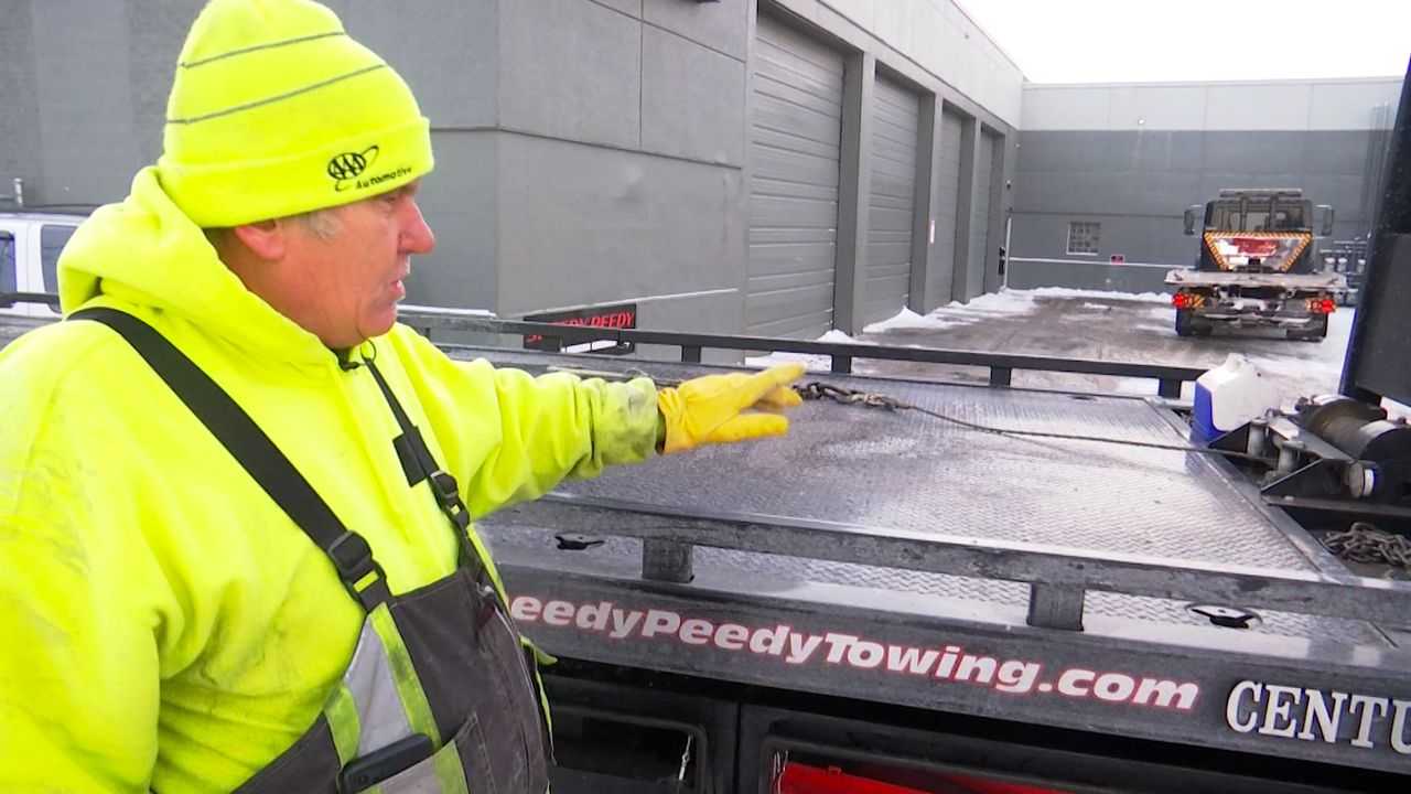 Harsh winter conditions keep tow truck companies busy